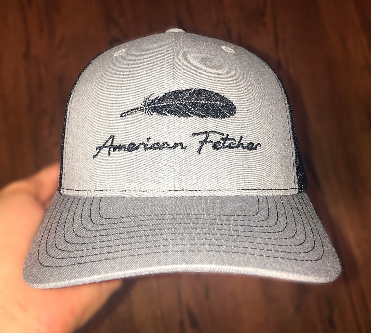 Heather Grey/Black Feather – American Fetcher